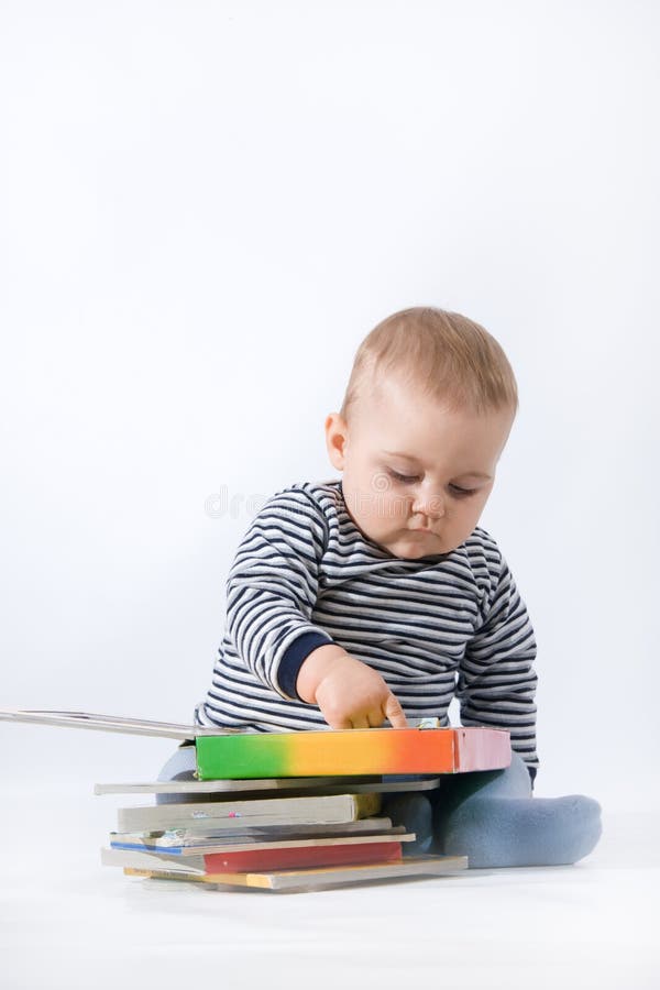 Baby and books stock image. Image of innocent, develop - 7657803