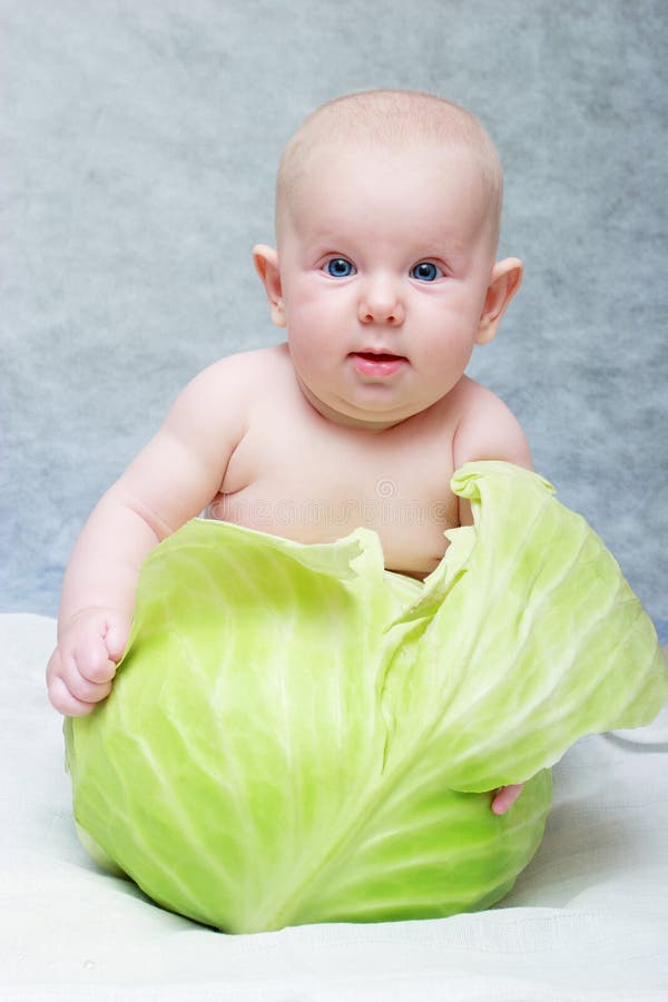 Baby born from cabbage stock photo. Image of closeup, daughter - 1458202