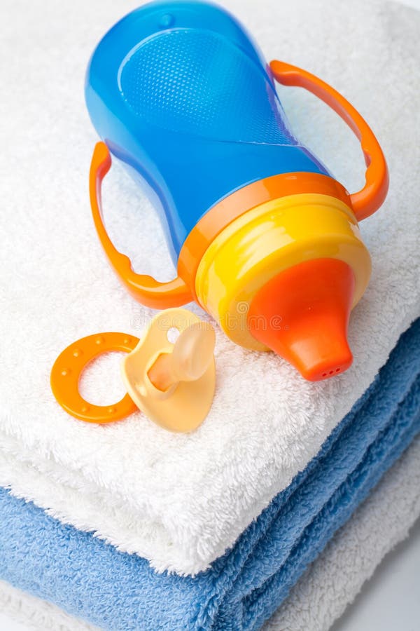 Baby: bottle and pacifier stock image. Image of close - 23186239