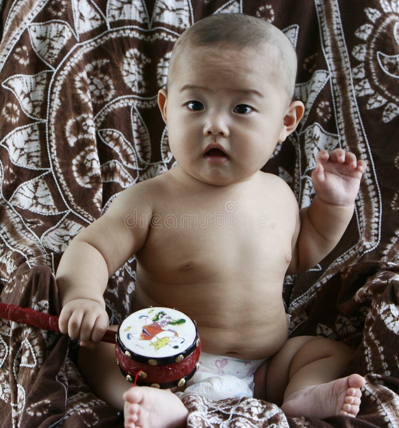 Baby boy stock photo. Image of yellow, human, body, drum - 5813994