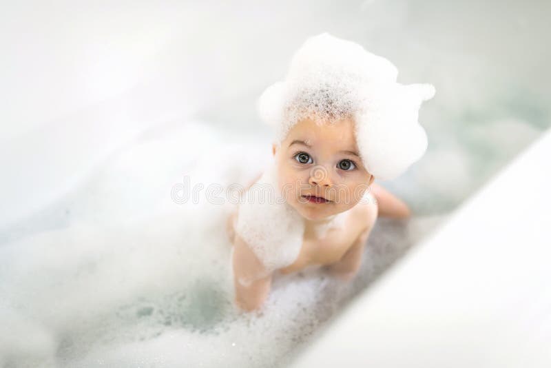 Baby Boy Bathes in a Bath with Foam and Soap Bubbles Stock Image ... Baby Boy Bathes in a Bath with Foam and Soap Bubbles Stock Image ...