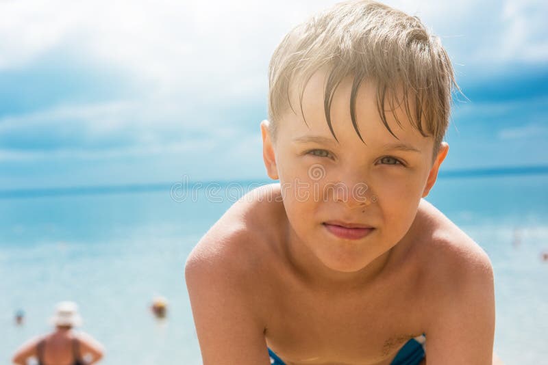 Baby boy at beach stock photo. Image of childhood, baby - 74820682