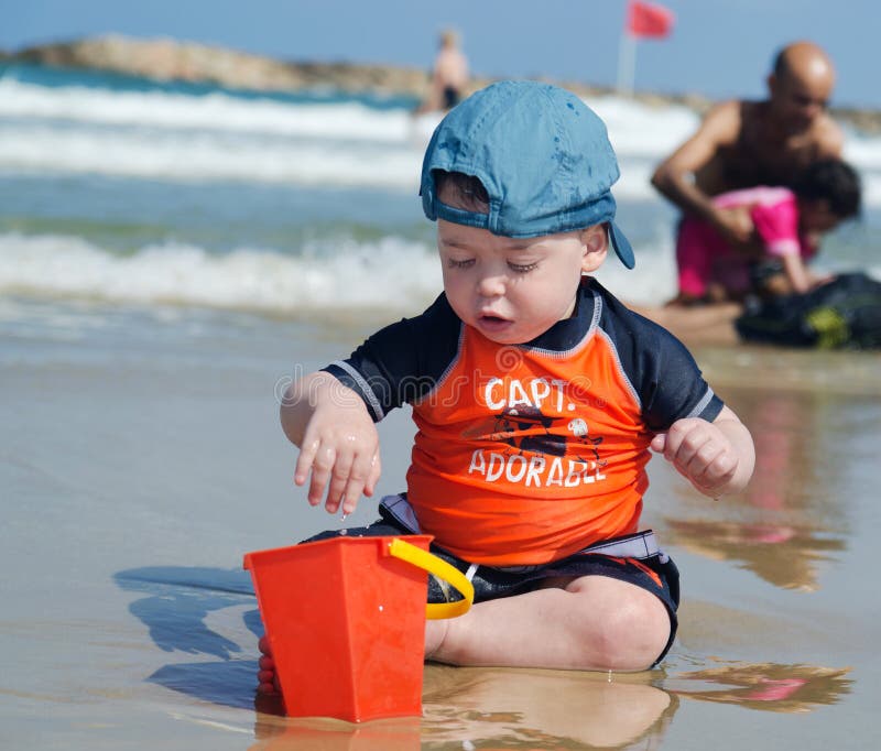 Baby boy at the beach stock image. Image of beach, activity - 32931047