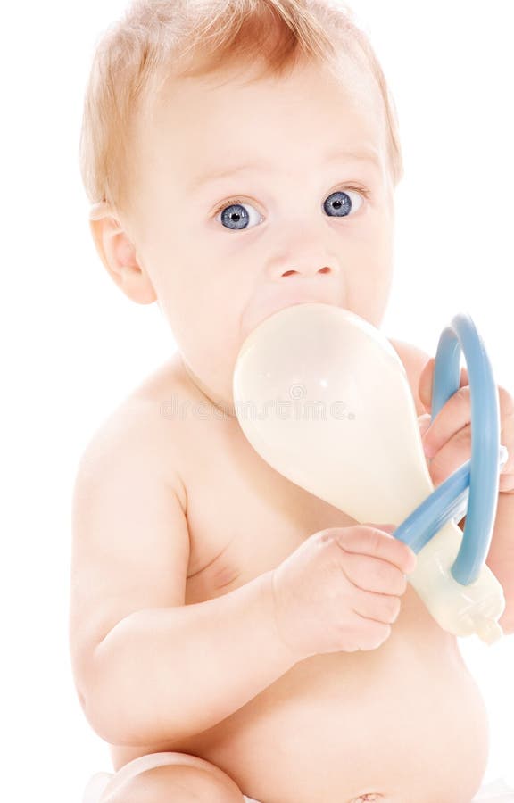 Baby boy with big pacifier stock photo. Image of comfortable - 11739324