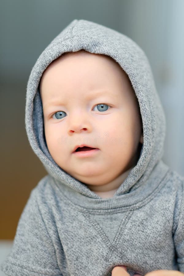 Baby boy with blue eyes stock image. Image of blue, innocence - 83691323