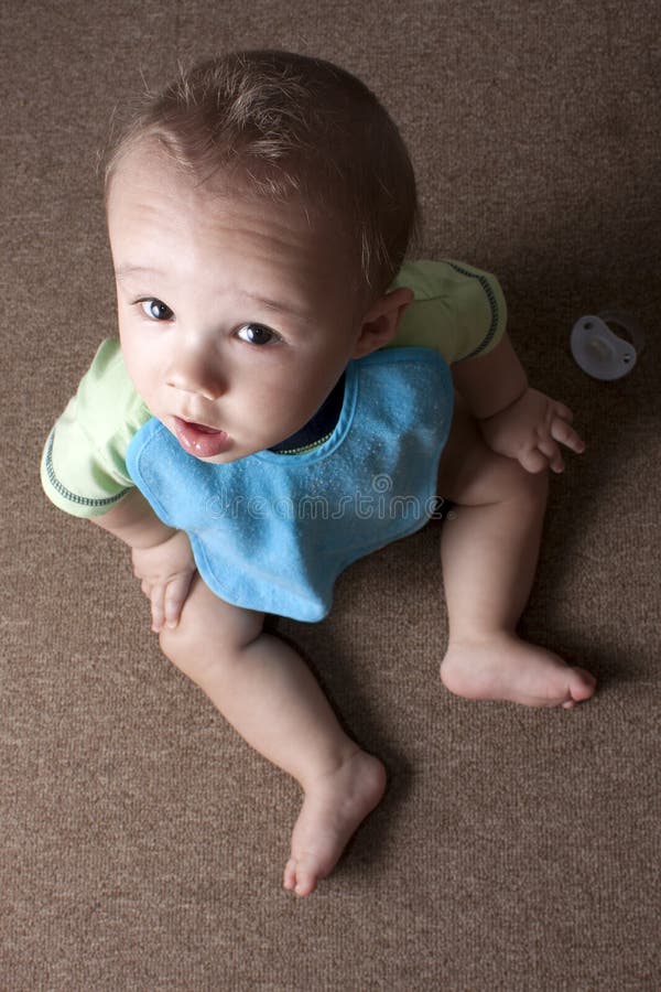 Baby Boy on Carpet Looking Up Stock Photo - Image of human, people ...
