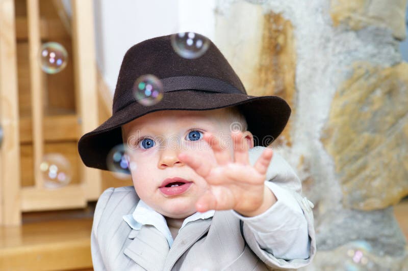The Baby Boy Catching Bubbles Stock Image - Image of small, caucasian ...