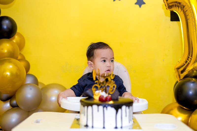 Baby Boy Celebrating His First Birthday. Handsome Baby and His Birthday ...