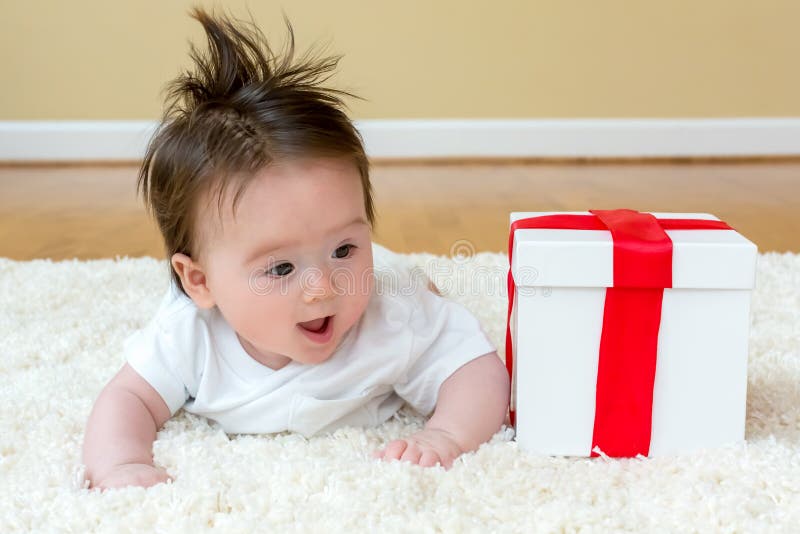 Baby Boy with a Christmas Present Stock Image - Image of house, face ...