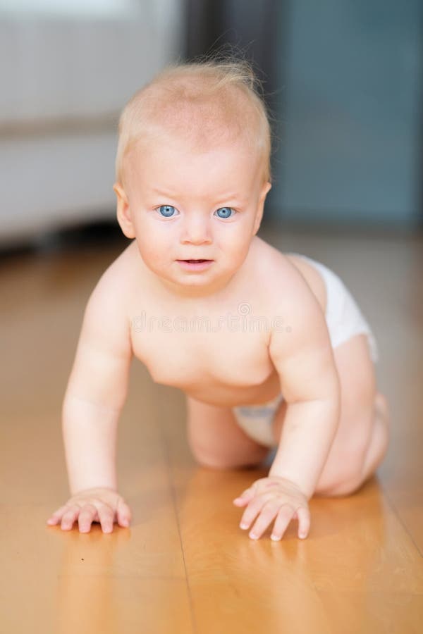 Baby boy crawling stock image. Image of offspring, care - 75282433