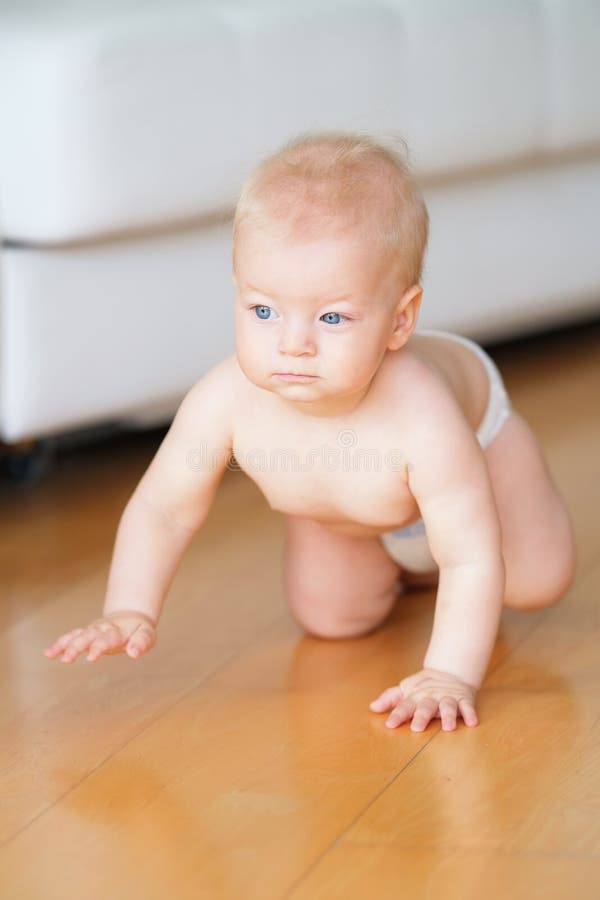 Baby boy crawling stock image. Image of childhood, family - 78475885