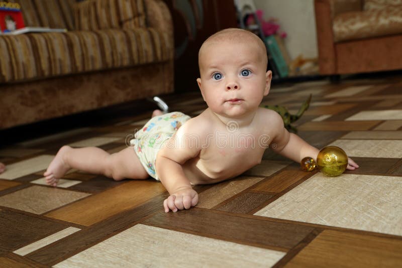 Baby Boy Crawling on the Floor Stock Photo - Image of home, indoor ...
