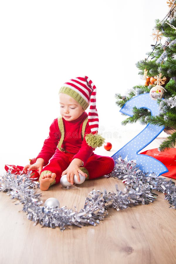 Baby boy dressed as elf stock photo. Image of baby, festive - 63731428