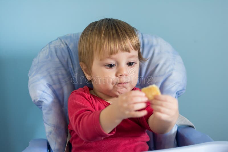 Baby Boy Eating Cheese Pie - Gibanica Stock Photo - Image of child ...