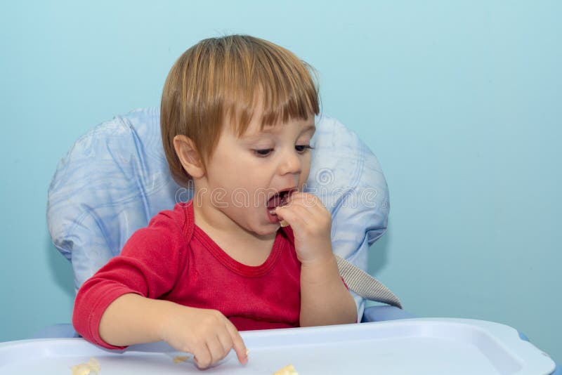 Baby Boy Eating Cheese Pie - Gibanica Stock Image - Image of front ...