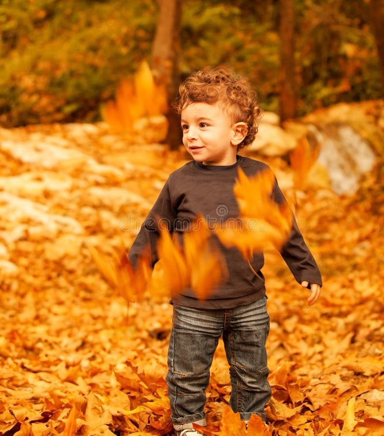 Baby boy in fall backyard stock photo. Image of male - 27449474