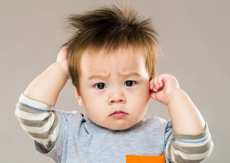 Baby boy feeling confused stock photo. Image of itch - 40943064