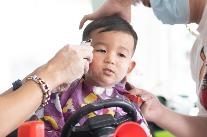 Baby Boy Getting Haircut in the Barber Shop Stock Photo - Image of baby ...
