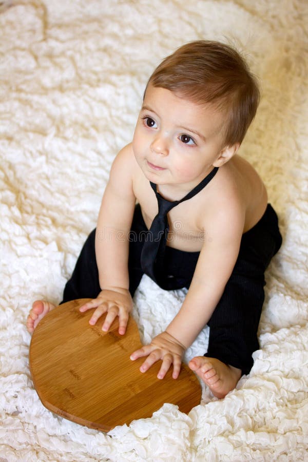 Baby boy with heart stock image. Image of white, valentines - 49944215