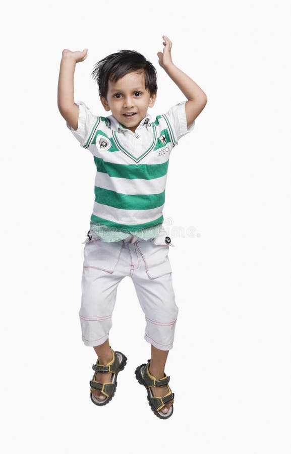 Baby Boy Jumping and Smiling Stock Image - Image of child, clothing ...
