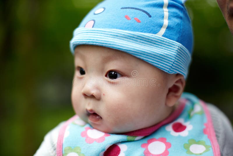 Baby boy looking stock image. Image of four, looking - 41373925
