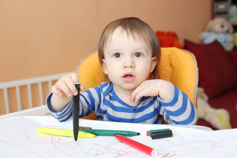 Baby boy with pens at home stock photo. Image of small - 38188644