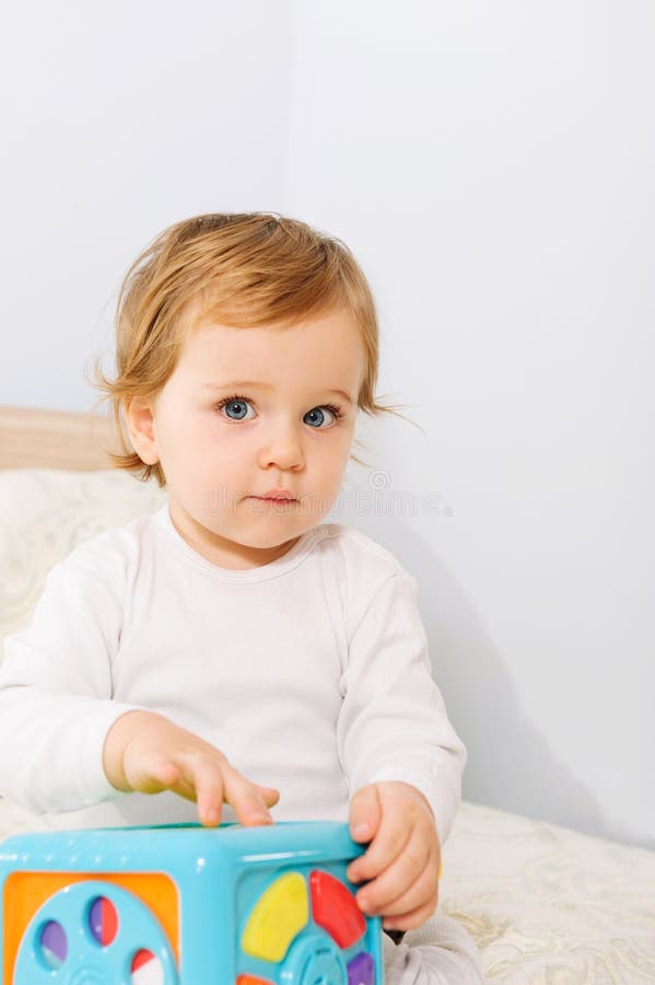 Baby boy playing indoors stock image. Image of kindergarten - 27971863
