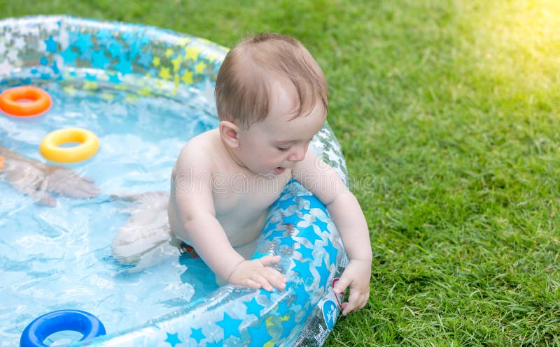 Baby Boy Playing in Swimming Pool at Garden Stock Image - Image of ...