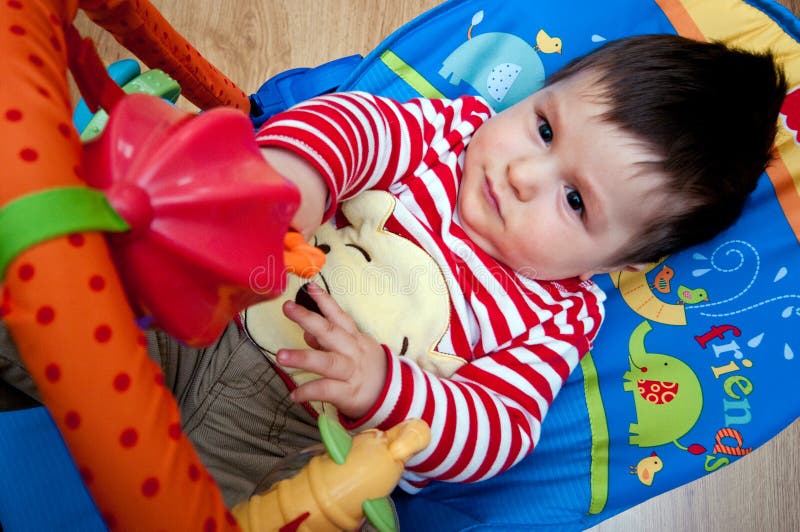 Baby on rocker stock image. Image of baby, beautiful - 15530983