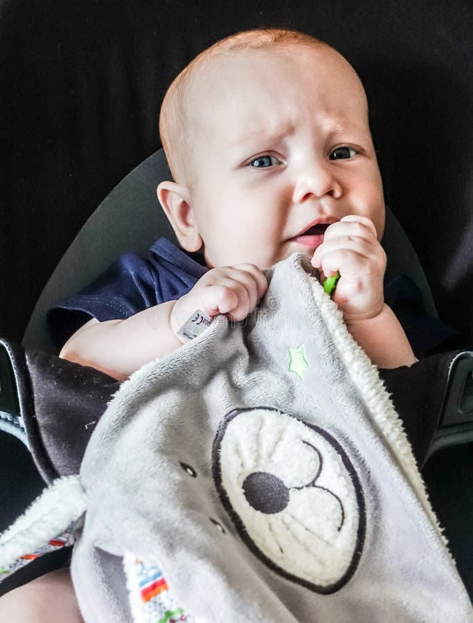 Baby boy sad expression stock image. Image of camera - 93932557