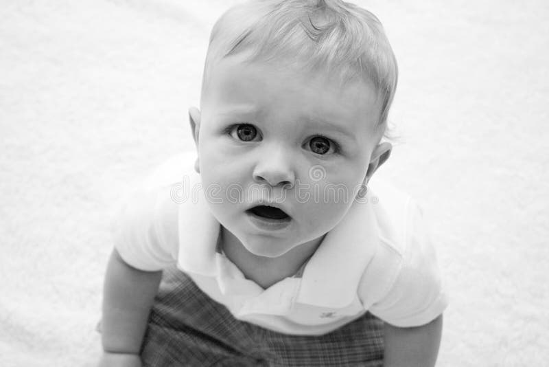 Baby Boy with a sad face stock image. Image of pout, white - 68637623