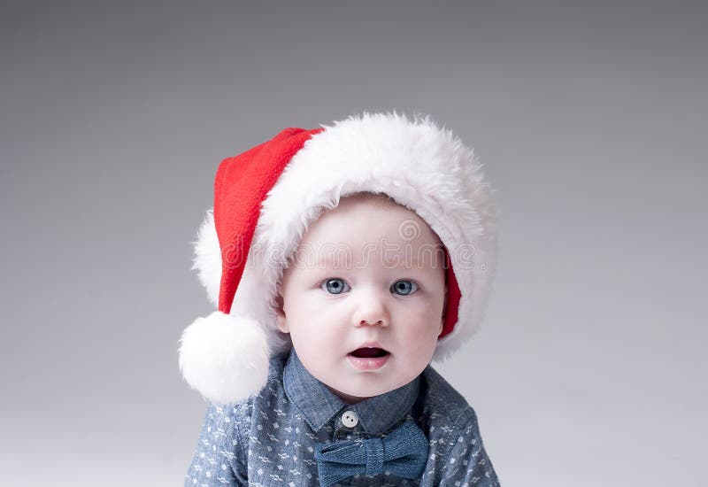 Baby boy in santa hat stock image. Image of claus, childhood - 60163167