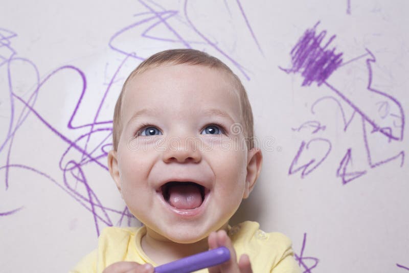 Baby boy scrawling writing stock photo. Image of baby - 73331080