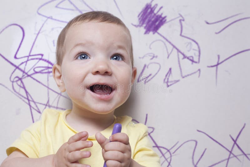 Baby boy scrawling writing stock photo. Image of baby - 73331080