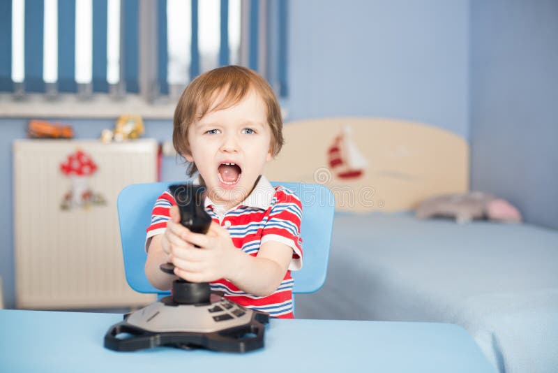 Baby Boy Screaming when Playing Computer Games Stock Photo - Image of ...