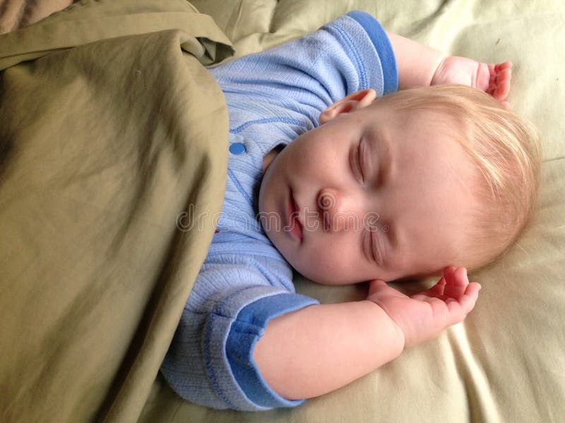 Baby Boy Sleeping Peacefully Stock Photo - Image of cuddling, cuddle ...