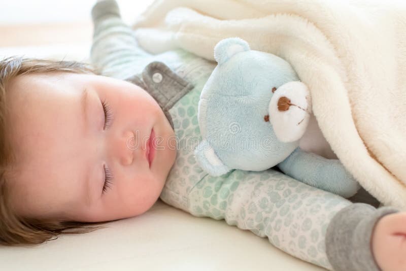 Baby boy sleeping stock image. Image of multiracial - 130822265