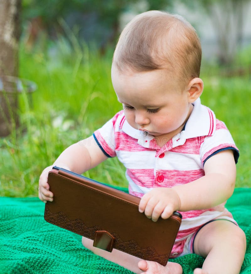 Baby boy with tablet stock image. Image of computer, lifestyle - 73593093