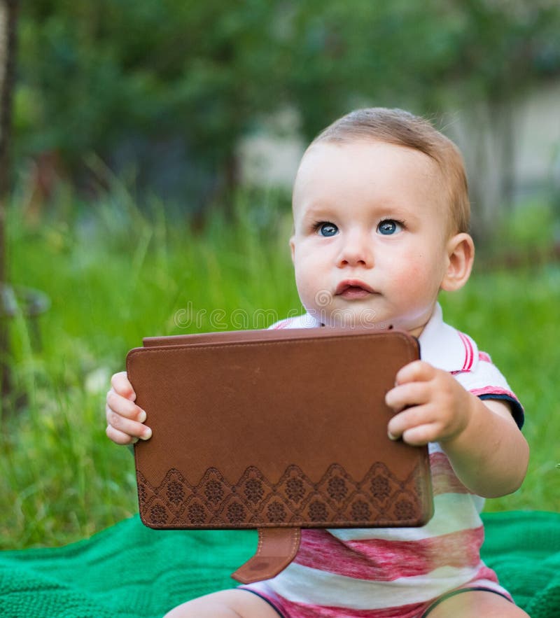 Baby boy with tablet stock image. Image of education - 73593077