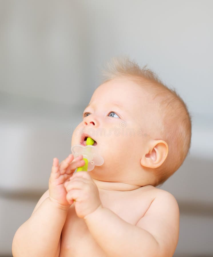 Baby boy with toothbrush stock photo. Image of infant - 77068046