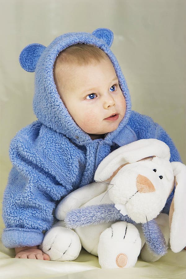 Baby boy with toy stock image. Image of lifestyle, bunny - 13344047