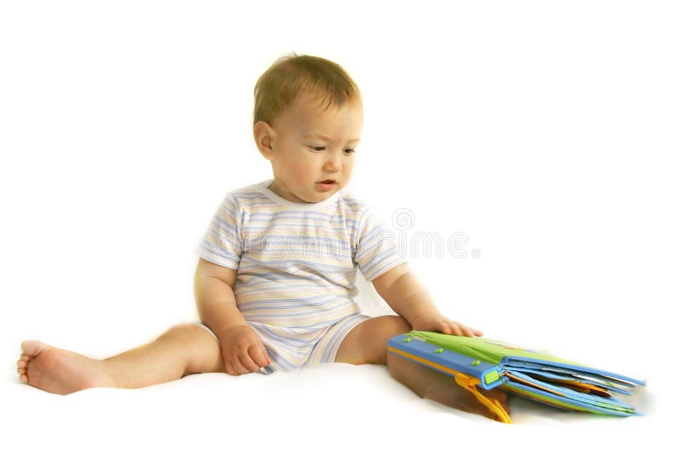Baby boy with toy-book stock photo. Image of play, baby - 5557002