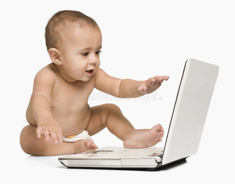 Baby boy using a laptop stock photo. Image of diaper - 36256600