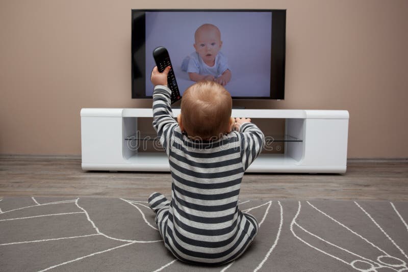 Baby watching TV stock image. Image of changing, relax - 11157737