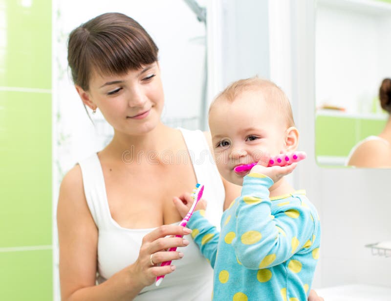 Baby Brushing Teeth in Bathroom Stock Photo - Image of mouth, hygiene ...
