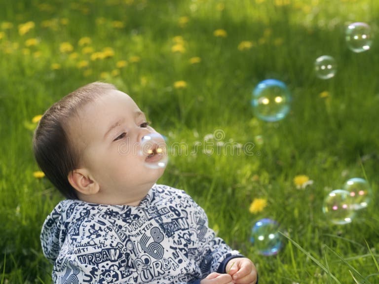 Baby and bubbles stock photo. Image of flower, springtime - 12417418