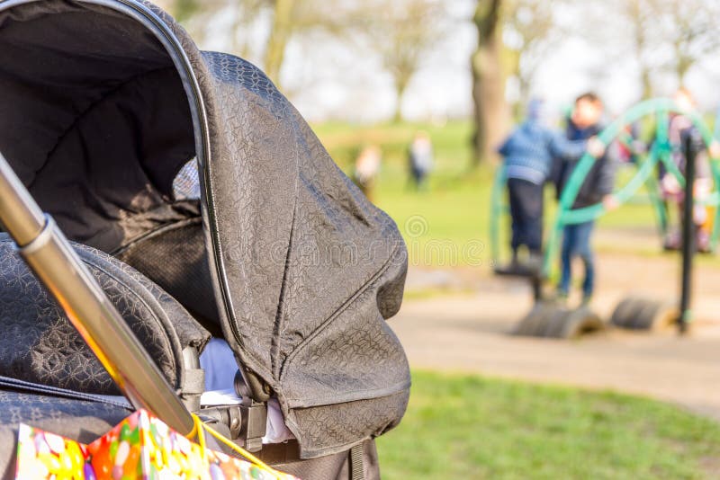 Baby Buggy Close Up View in Sunny Playground Stock Photo - Image of ...