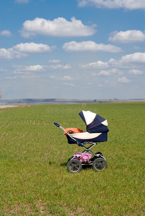 A Baby Buggy Standing Alone in the Fields Stock Photo - Image of ...
