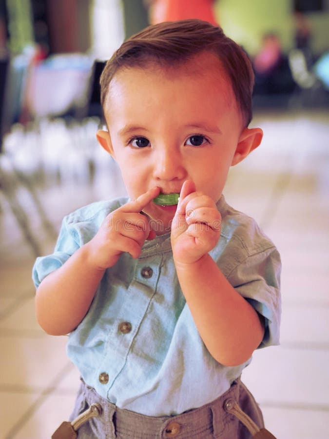 Baby with a candy stock image. Image of cute, lollypop - 121008433