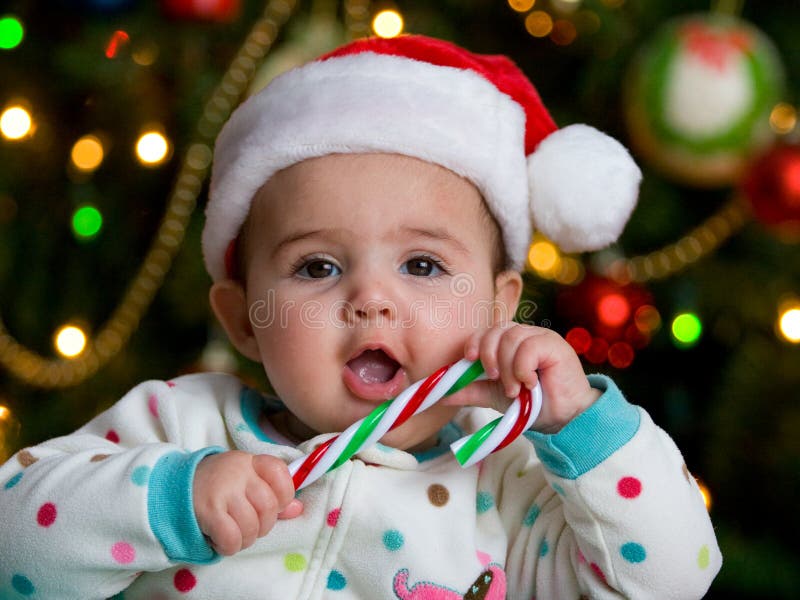 Baby with a Candy cane stock photo. Image of decorations - 4975164